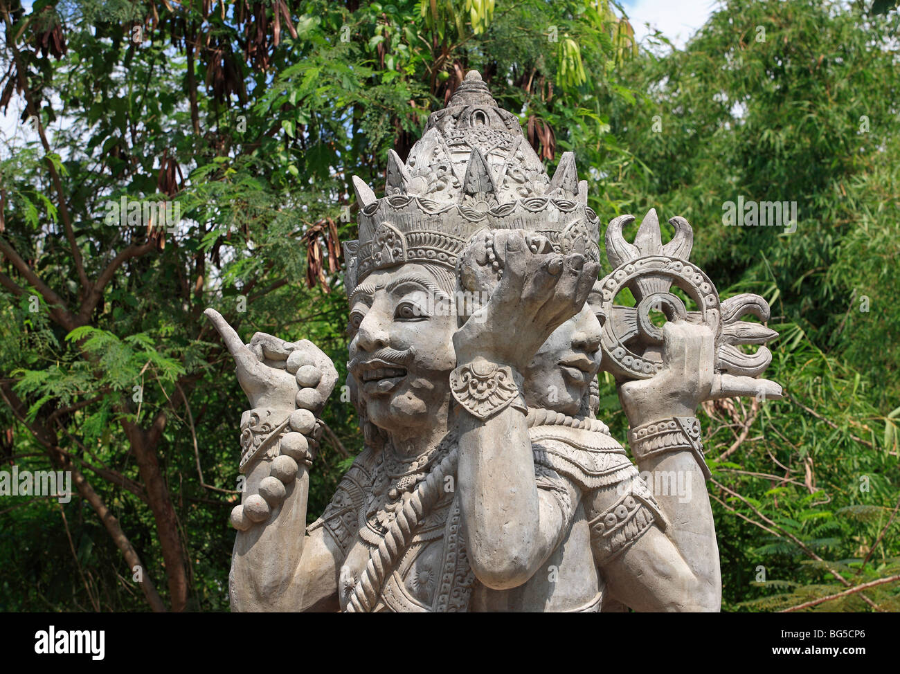 a carved stone statue, Bali, Indonesia Stock Photo - Alamy