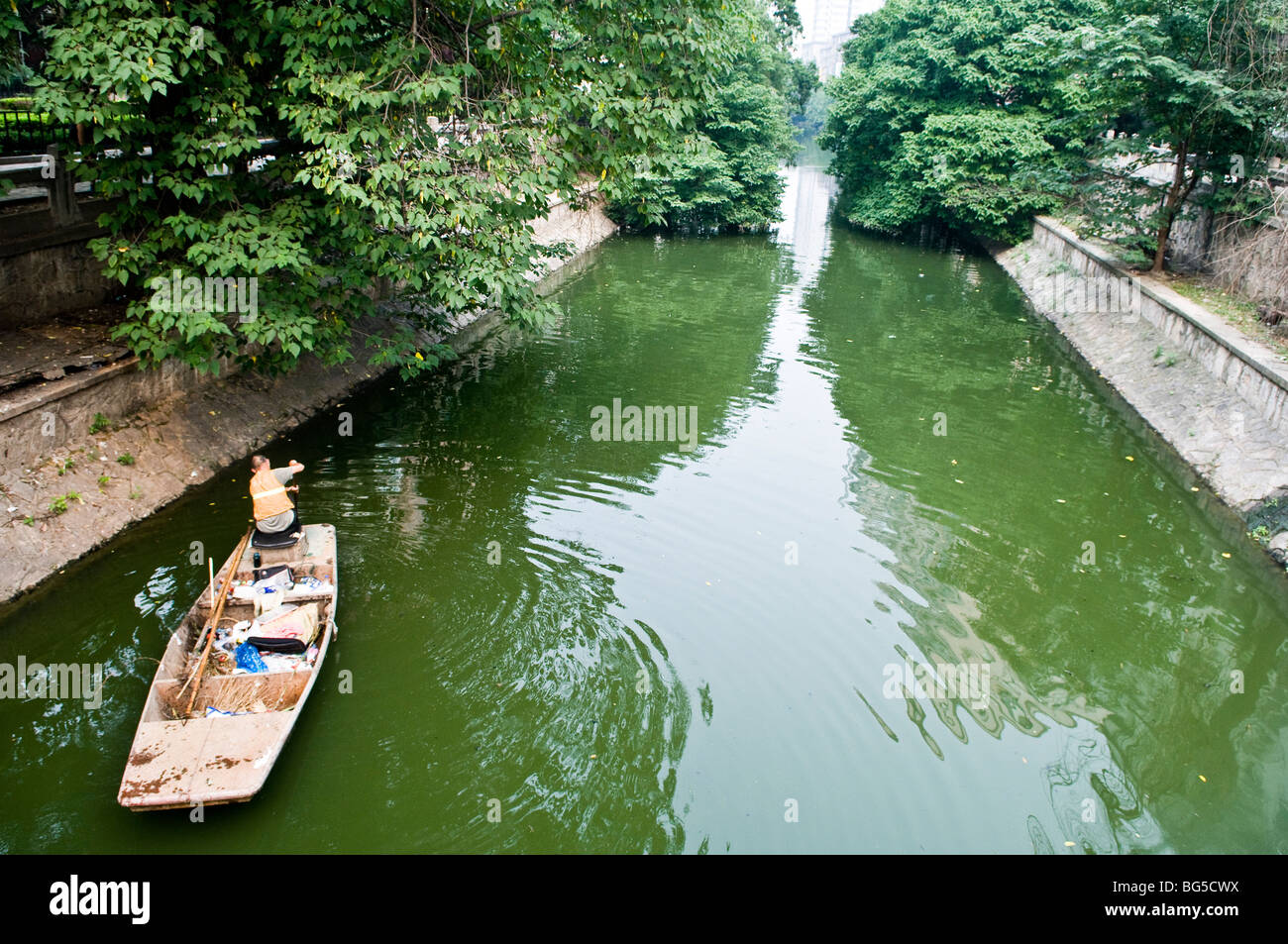 Canal cleaning by boat hi-res stock photography and images - Alamy