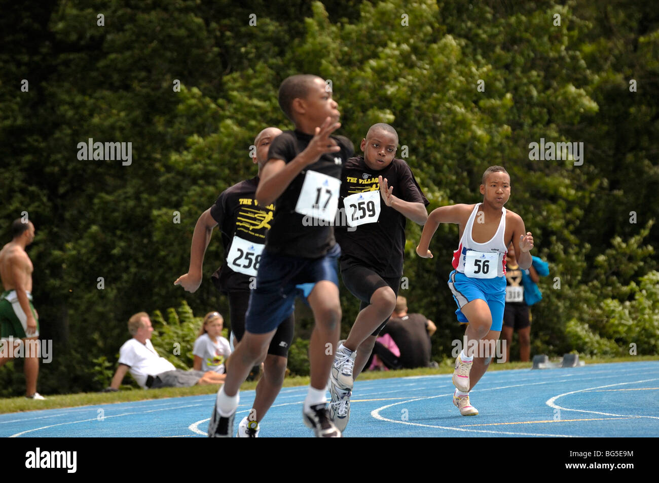 Young boy runners at the Track and Field competition during the ...