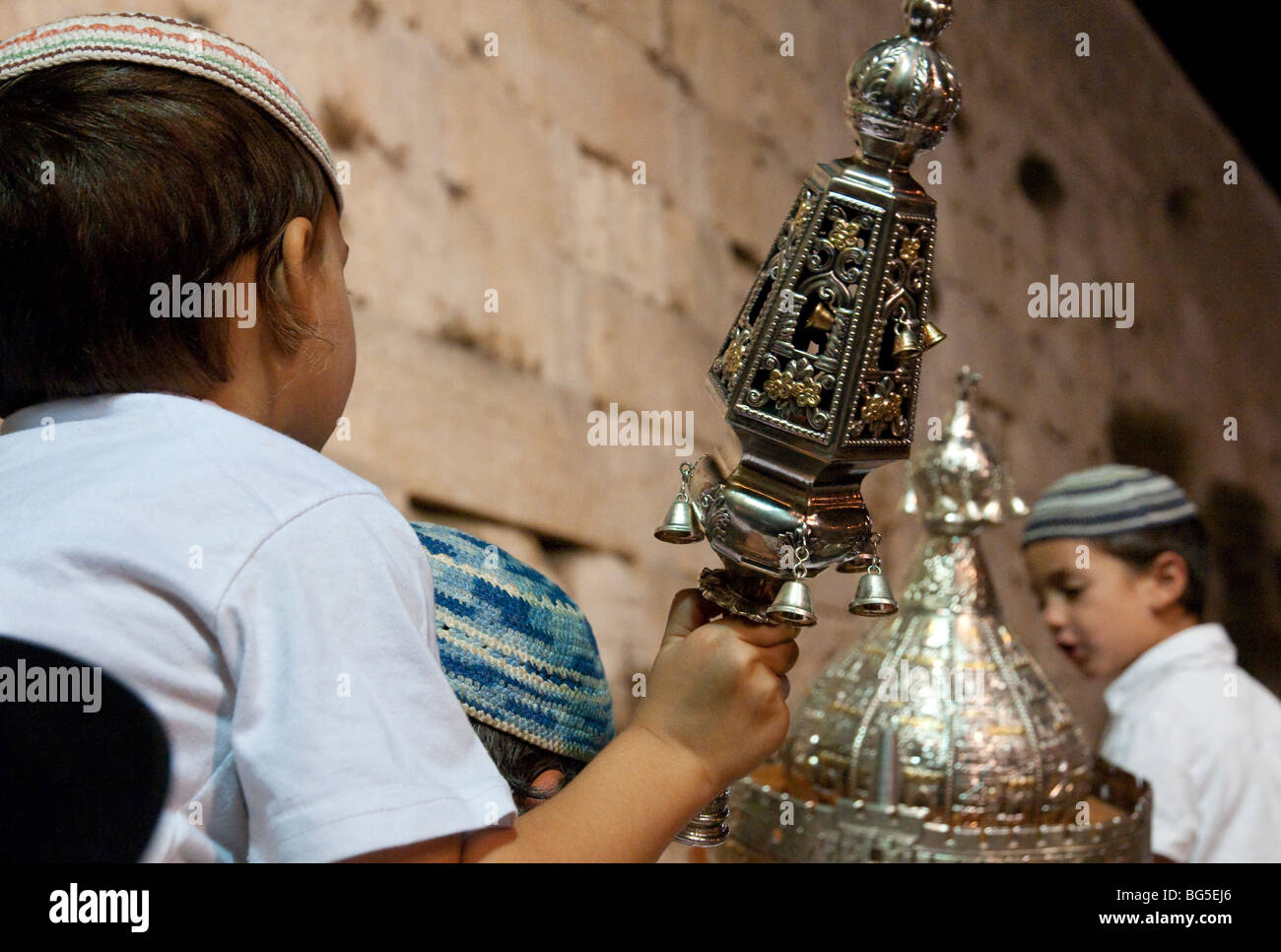 children dancing with torah srolls during Simhat torah jewish festival ...
