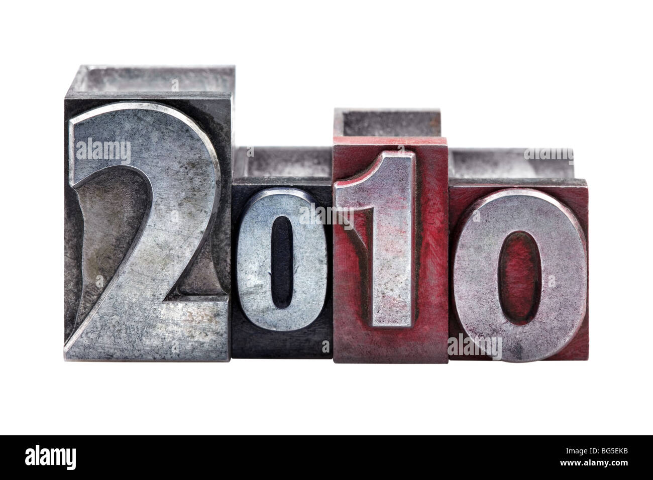 The numbers or date 2010 in old worn letterpress, isolated on a white ...