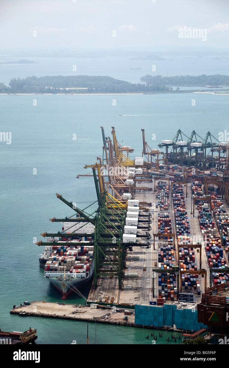 An elevated view shows a container ship docked at at the Port of ...