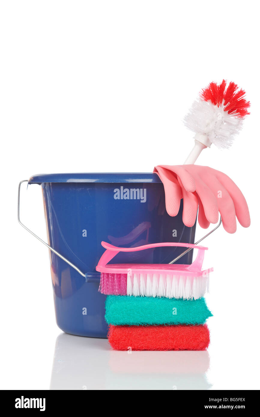 Cleaning tools in a plastic bucket over a white background. Shallow ...