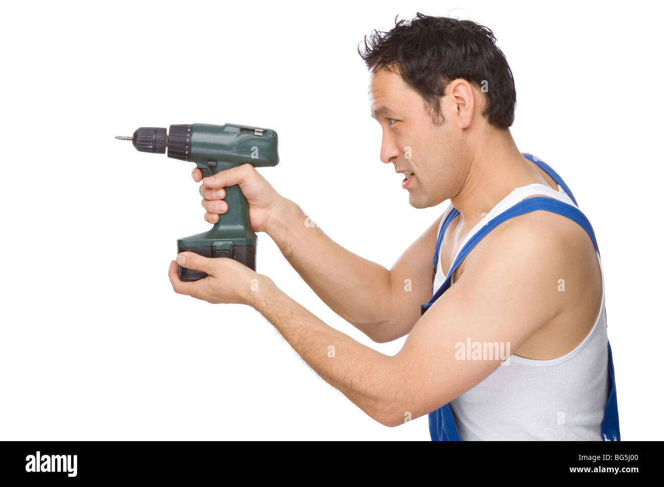 Full isolated studio picture from a craftsman with drill machine Stock ...