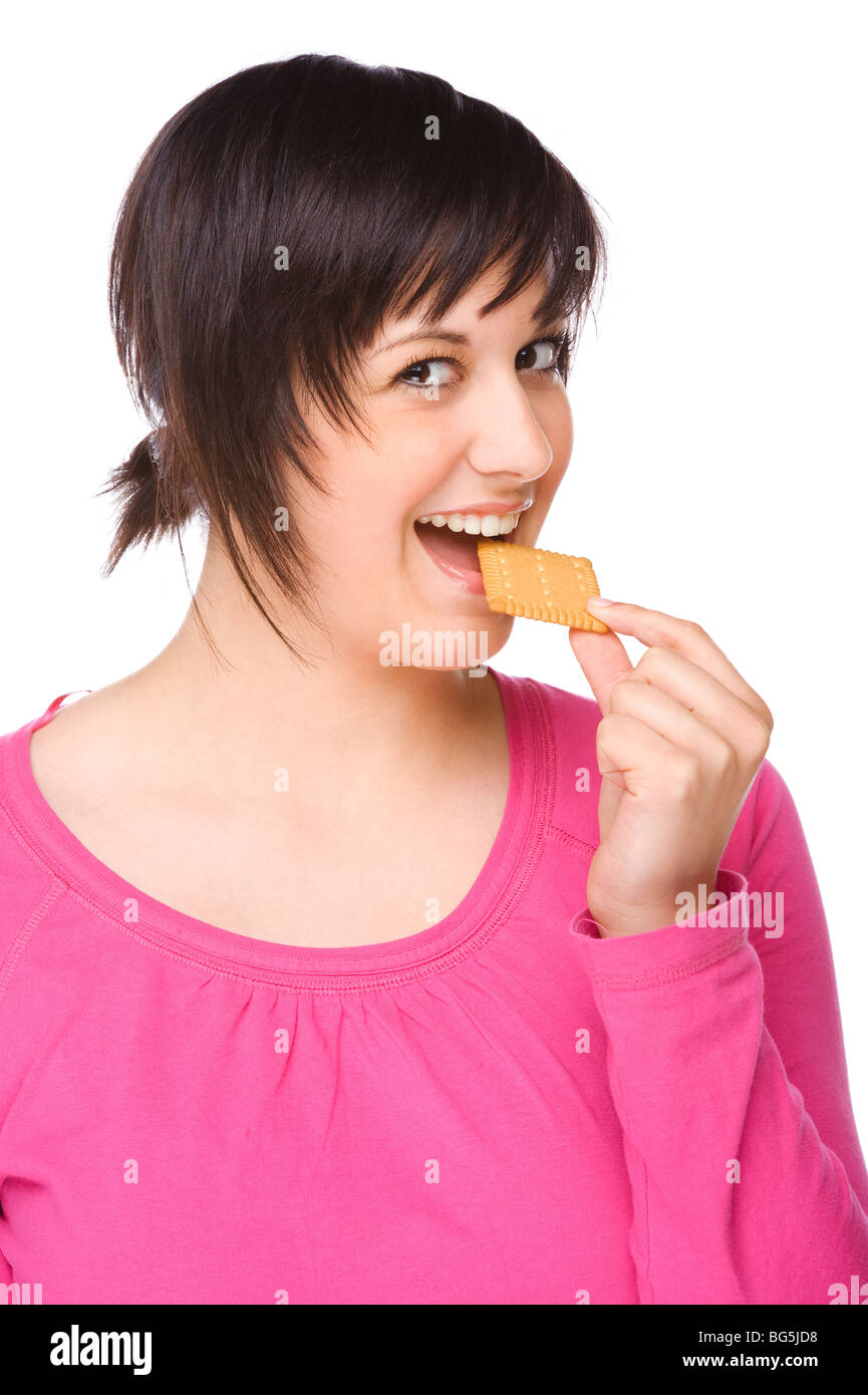 Full isolated portrait of a beautiful caucasian woman eating some ...
