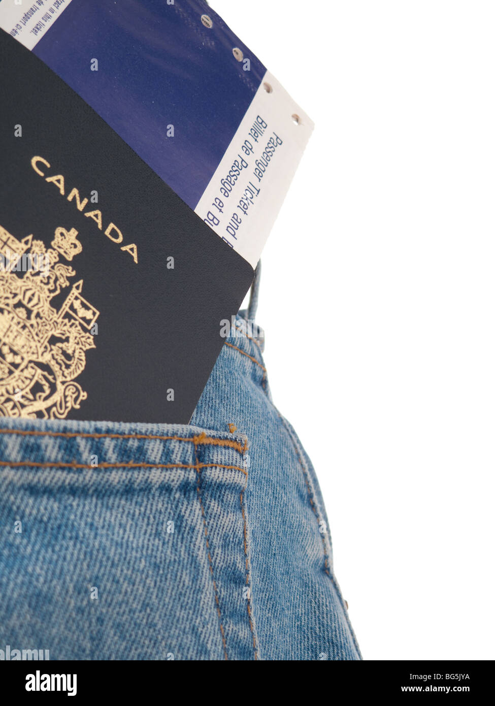 A passport and airline ticket in a back pocket of someone wearing jeans ...