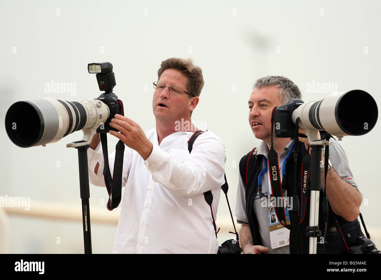 Photographers at work, Dubai, United Arab Emirates Stock Photo - Alamy