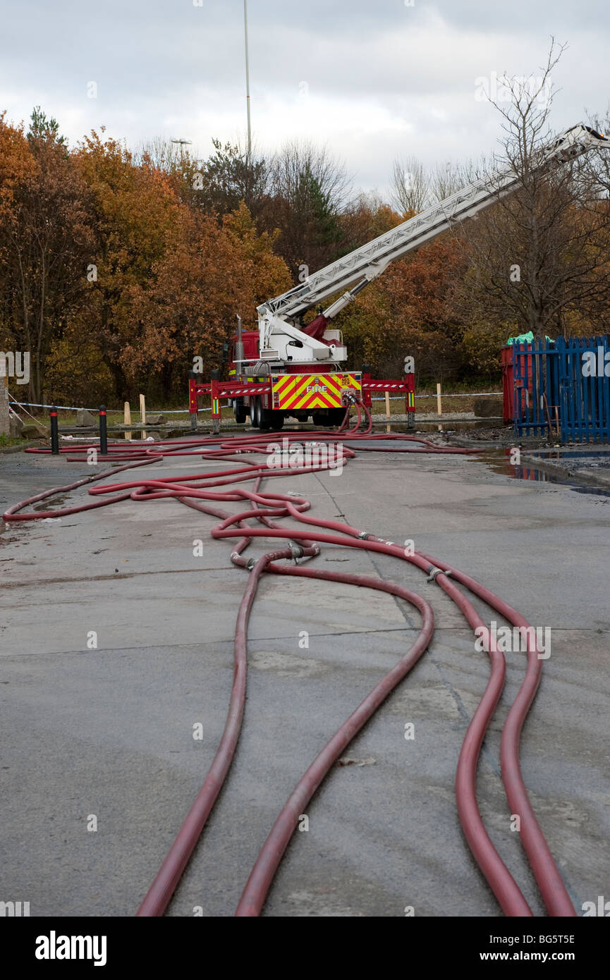 Fire Service Hydraulic Platform and hose at large fire Stock Photo - Alamy