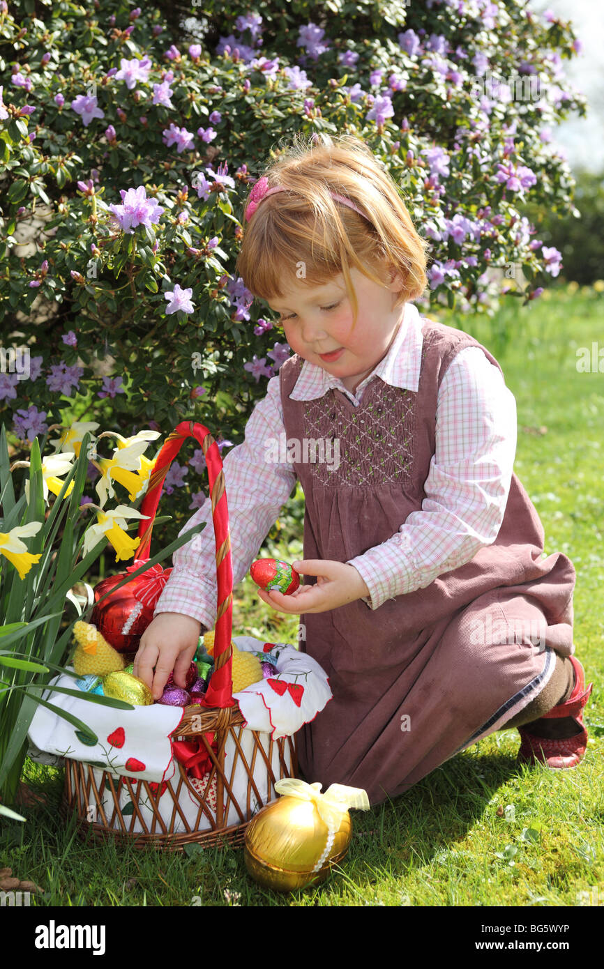 A young girl on an Easter egg hunt in Lancashire, UK Stock Photo - Alamy