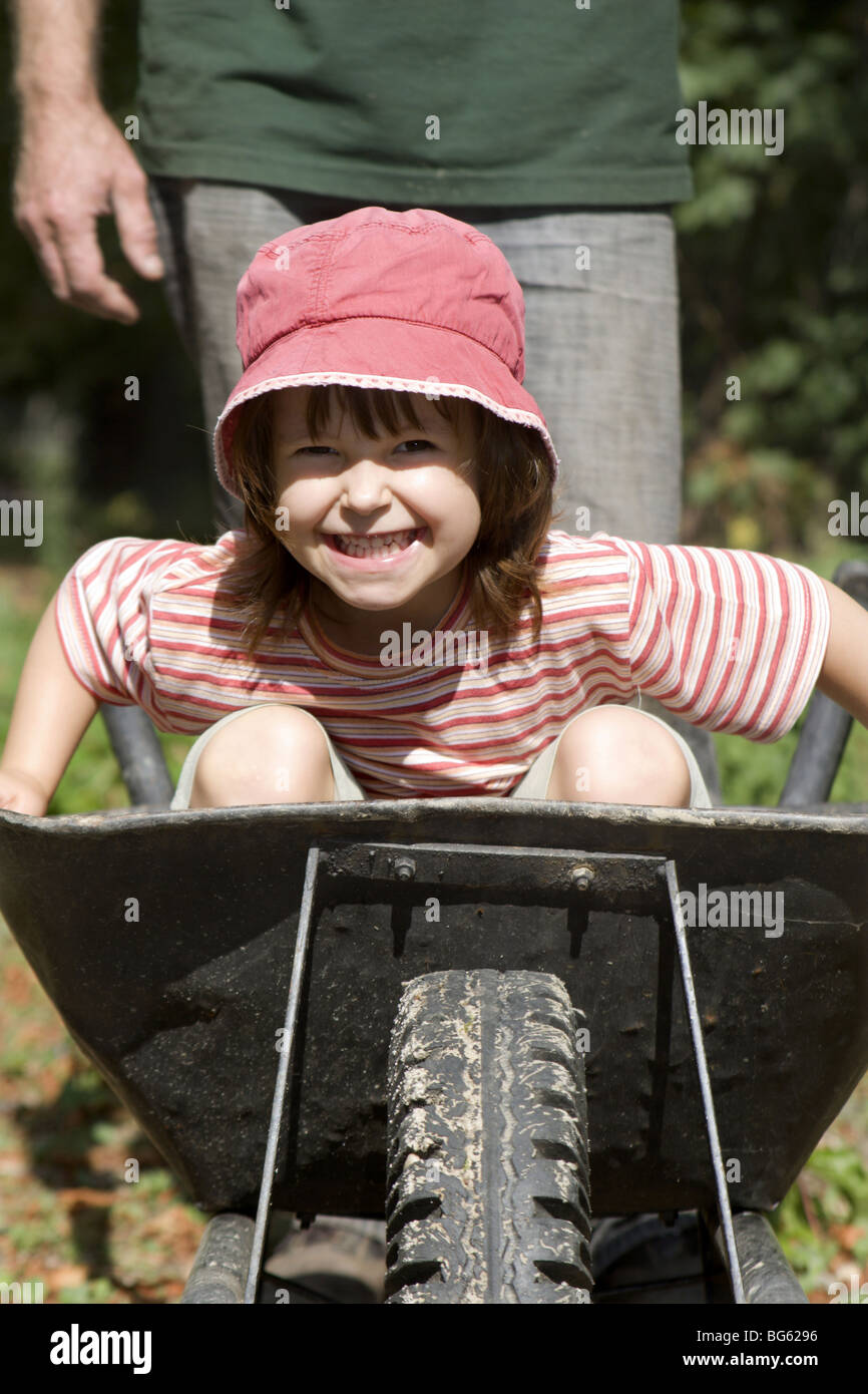 little girl in barrow Stock Photo - Alamy