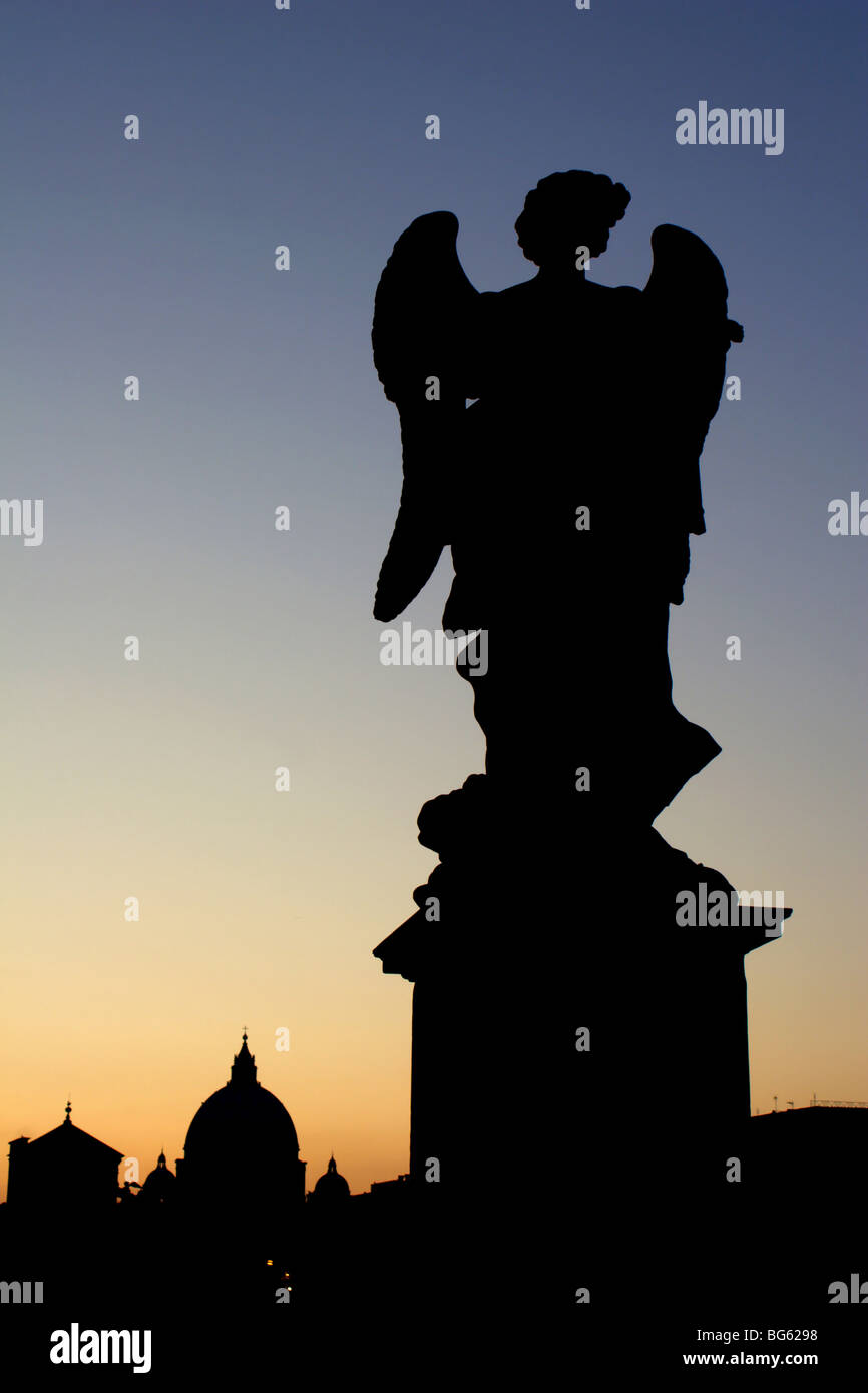 Rome - silhouette of angel form angels bridge - sunset Stock Photo - Alamy