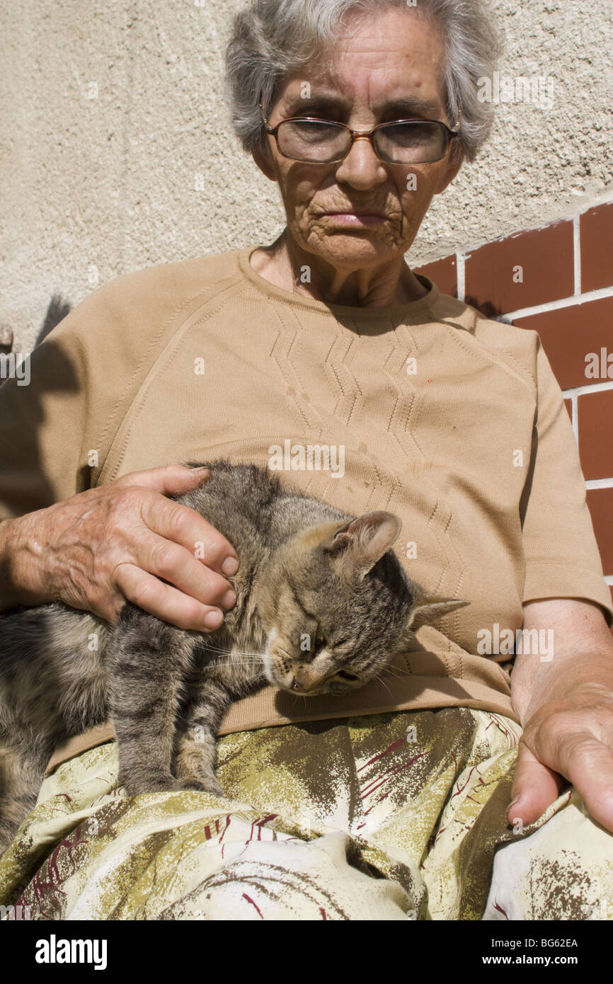 old woman with the cat Stock Photo - Alamy