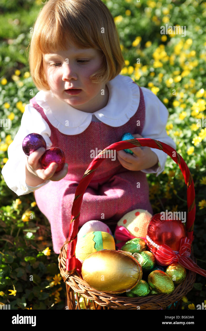 A young girl on an Easter egg hunt in Lancashire, UK Stock Photo - Alamy