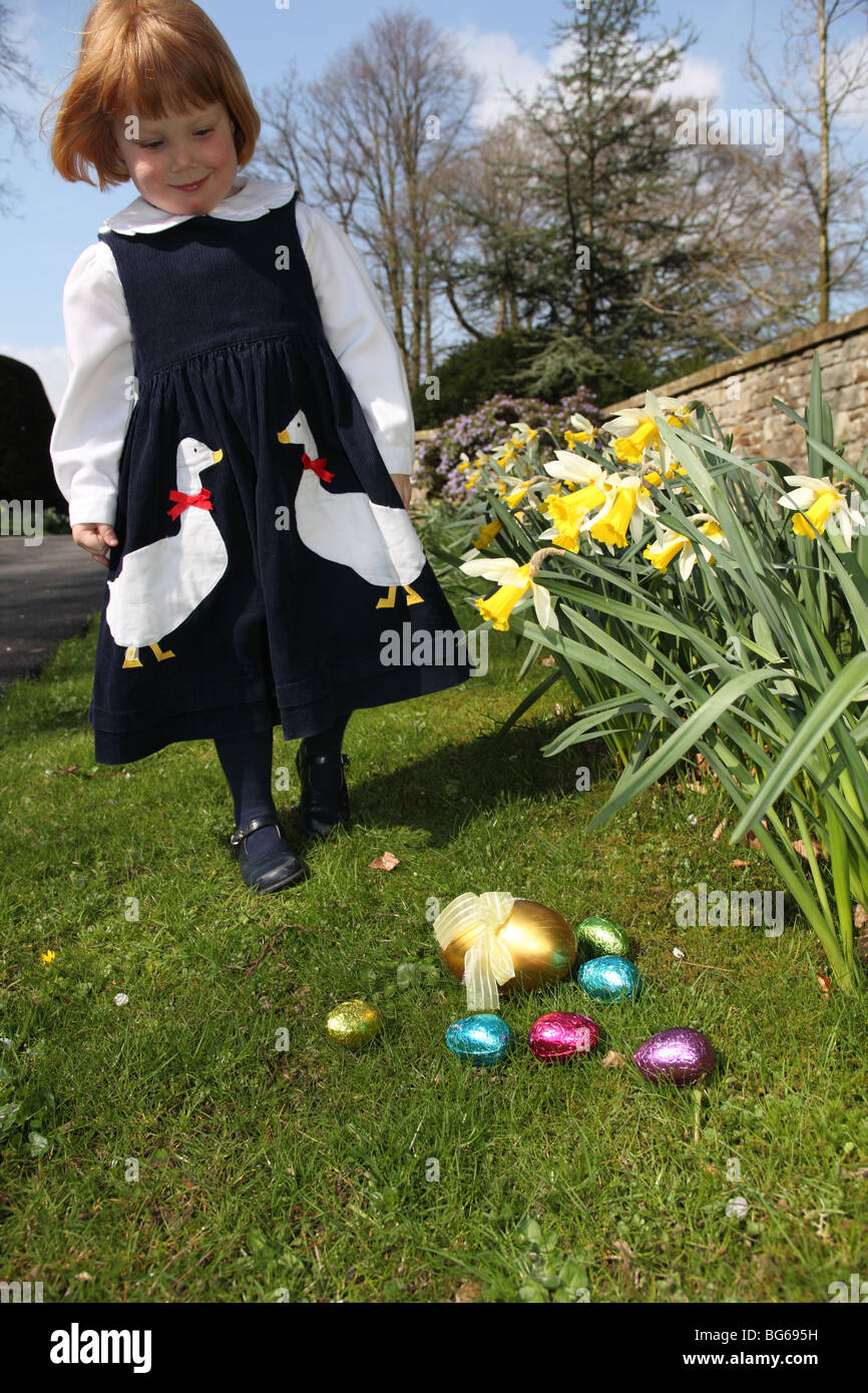 A young girl on an Easter egg hunt in Lancashire, UK Stock Photo - Alamy