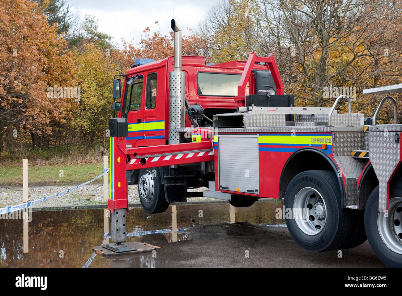 Fire Service Hydraulic Platform in use raised on legs Stock Photo - Alamy