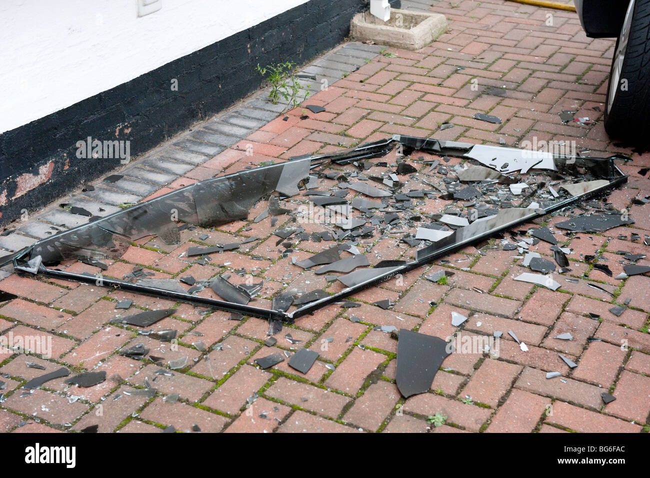burnt and smashed window from house bedroom fire Stock Photo - Alamy