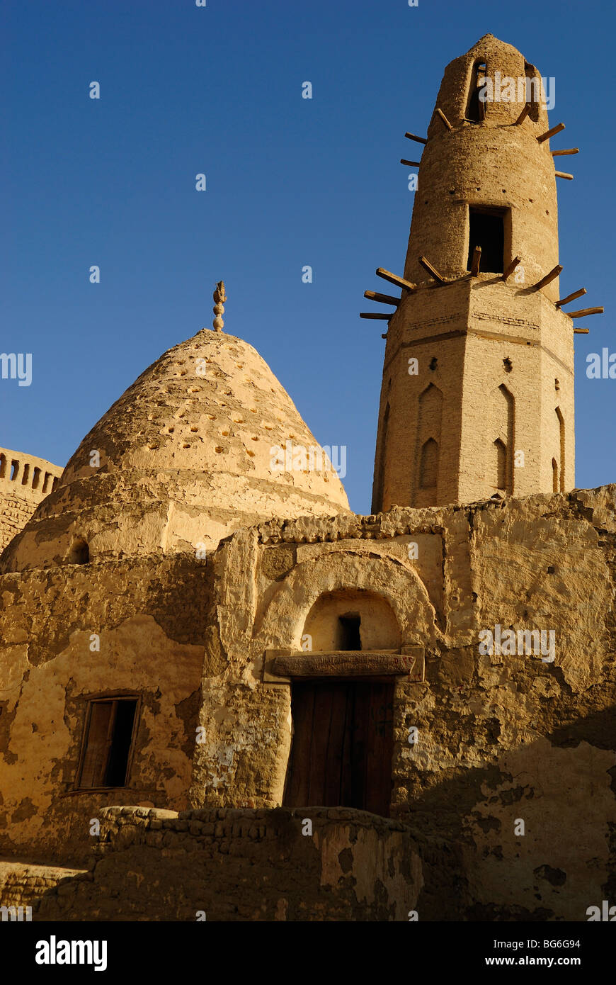 Minaret of the Nasr el-Din mosque of the city of Al Qasr in Dakhla ...