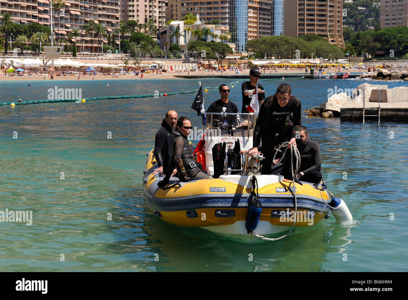 Inflatable boat loaded with scuba divers back to the jetty in Monaco ...