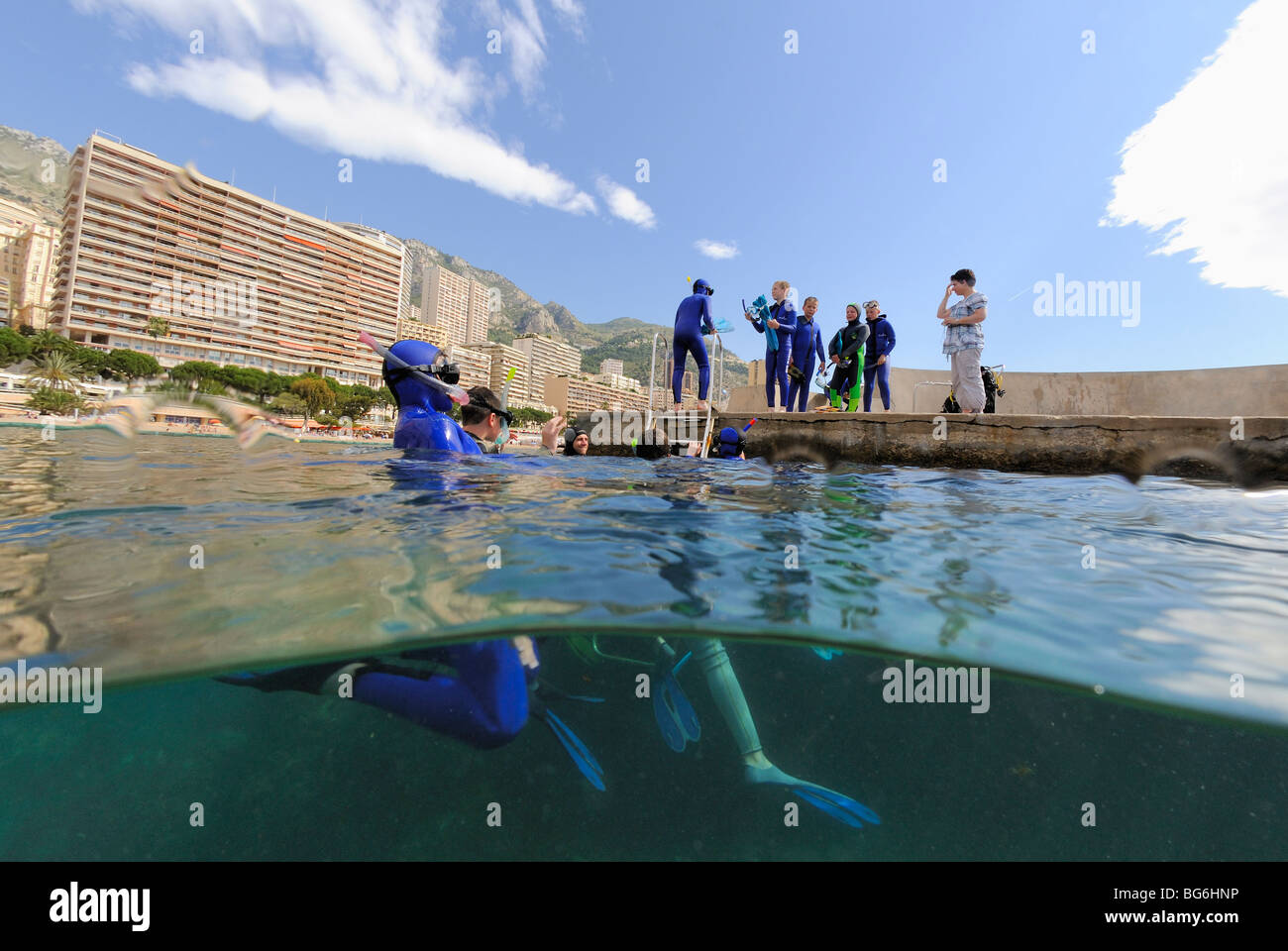 Teenagers learning how to do a giant stride Monaco Stock Photo - Alamy