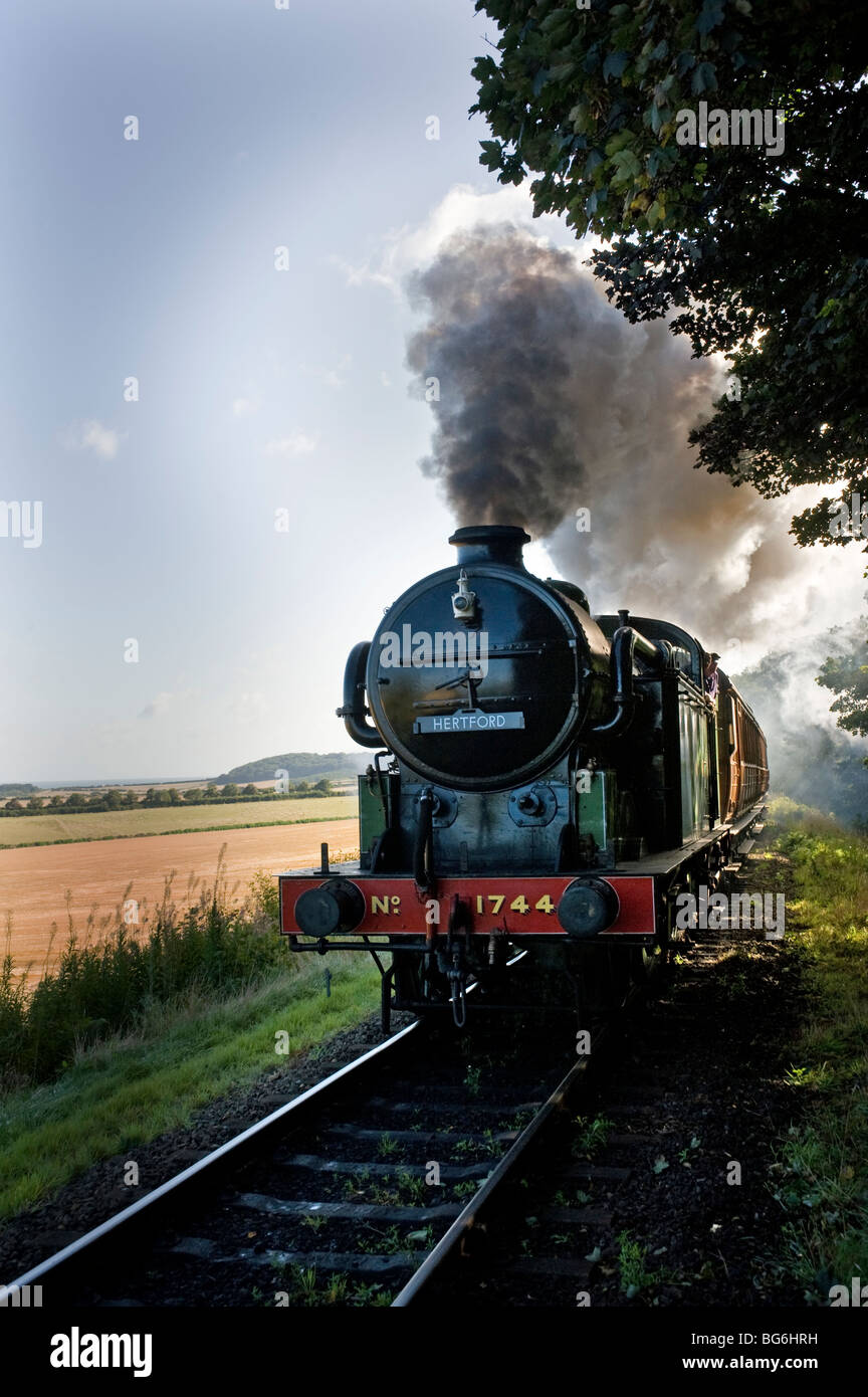 steam railway engine hertford puffing up incline at kelling on north ...