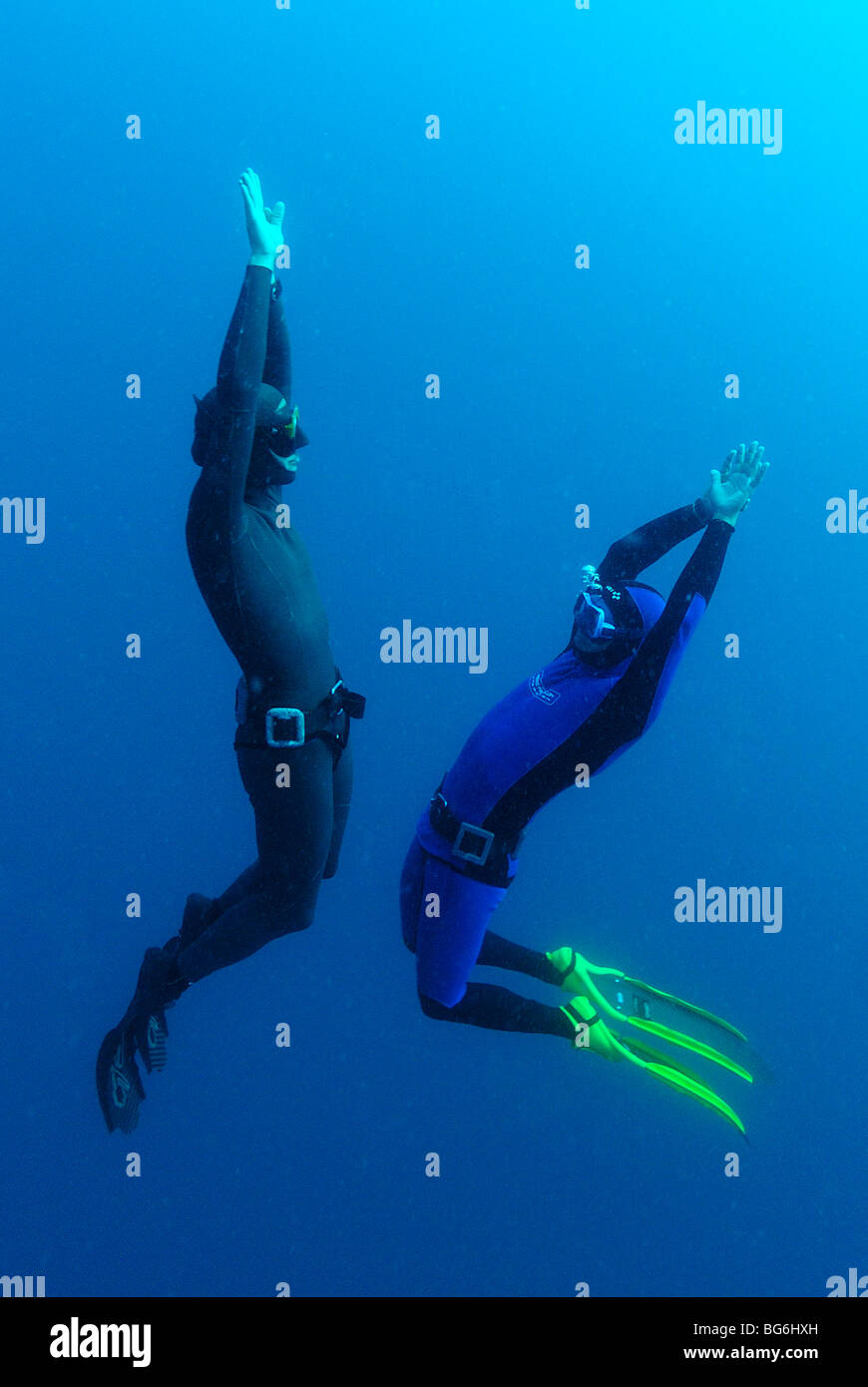Two free divers going up in the Mediterranean Sea, off Monaco Stock ...