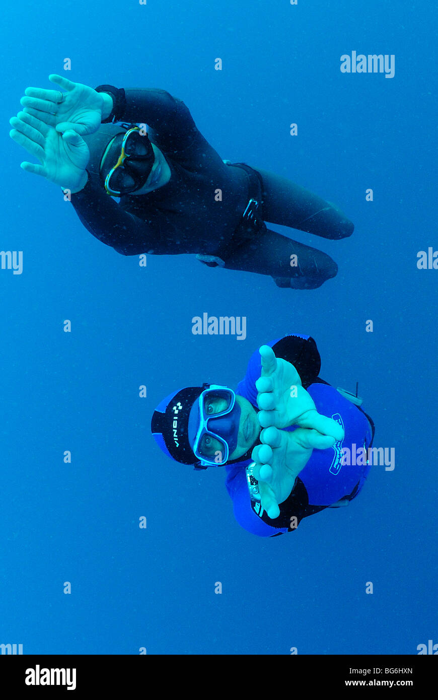 Two free divers going down in the Mediterranean Sea, off Monaco Stock ...