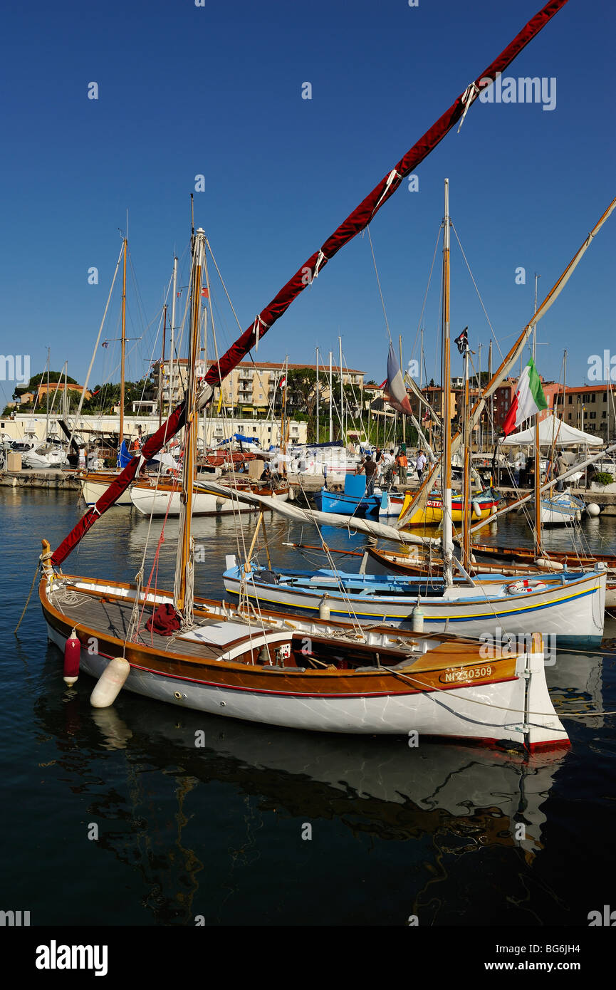 Small wood fishing boats moored in Saint Jean Cap Ferrat harbour ...