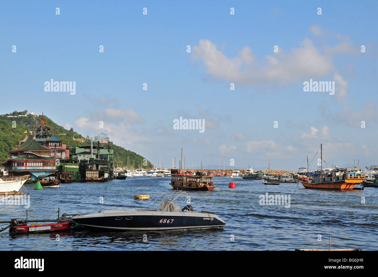 Eastern end of the Aberdeen Harbour Typhoon Shelter, with a golden ...