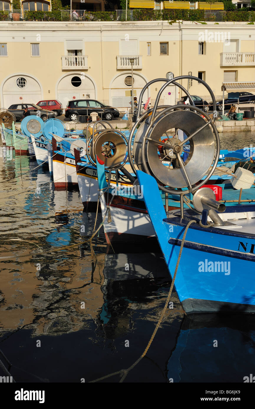 Small wood fishing boats moored in Saint Jean Cap Ferrat harbour ...