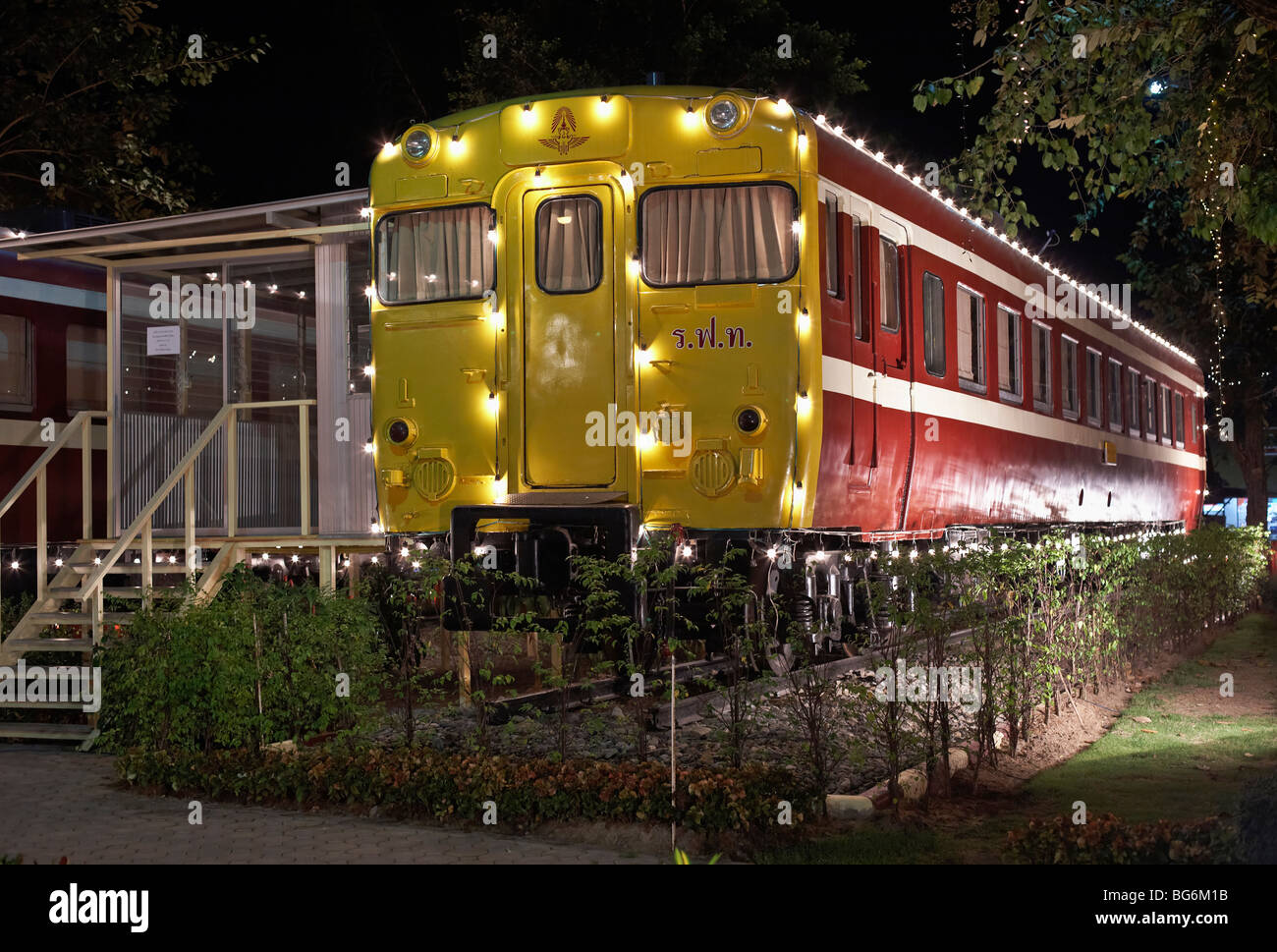 Unusual conversion of an old train carriage to a public library. Hua ...