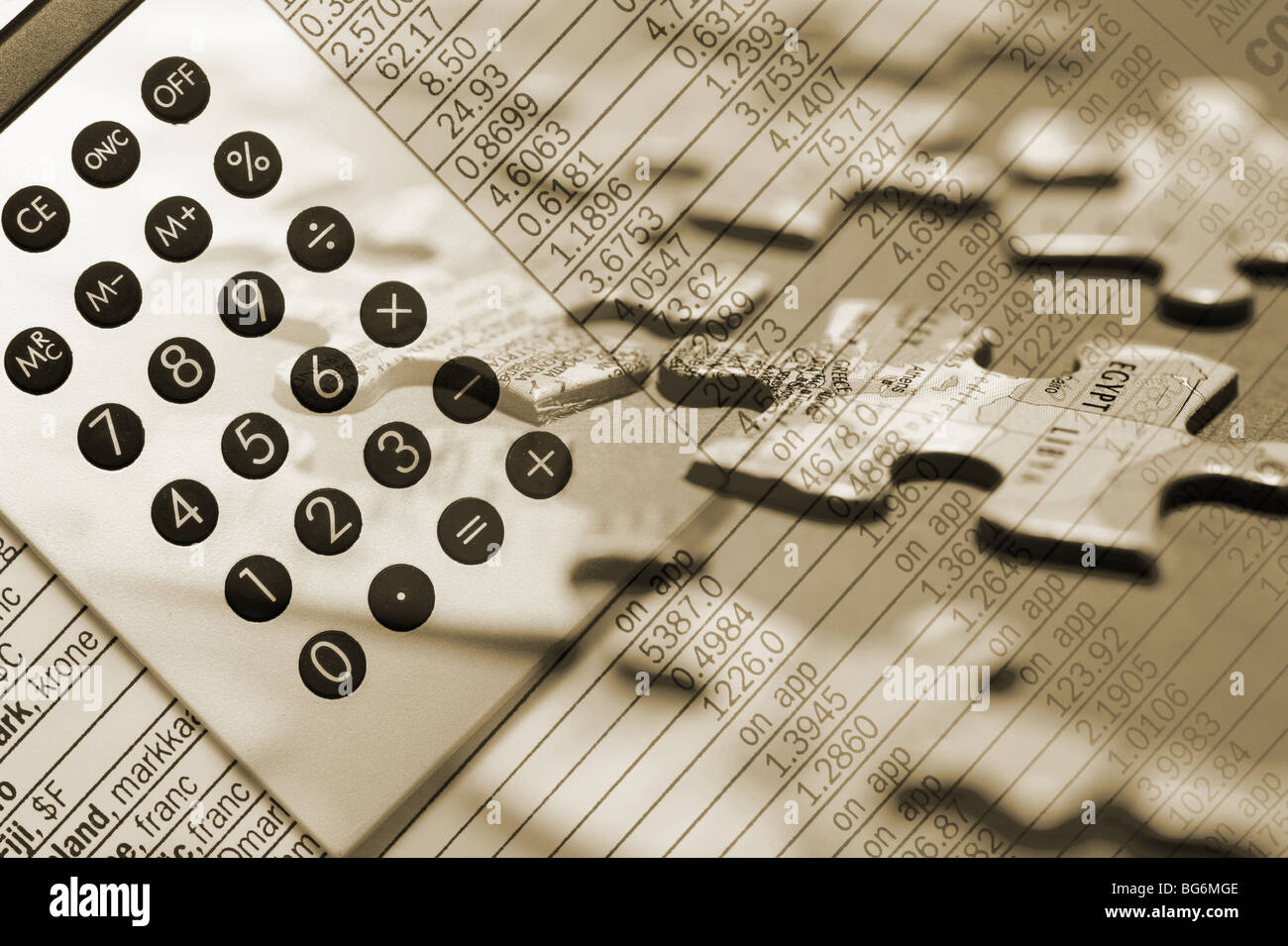 Calculator and Jigsaw Puzzle Pieces Stock Photo - Alamy