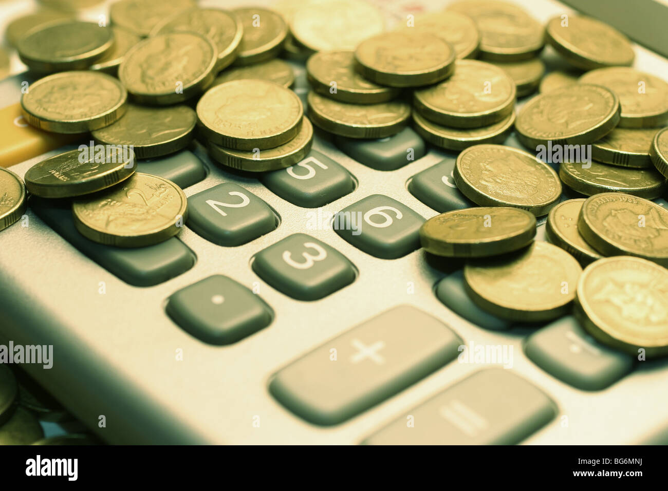Calculator math coins hi-res stock photography and images - Alamy