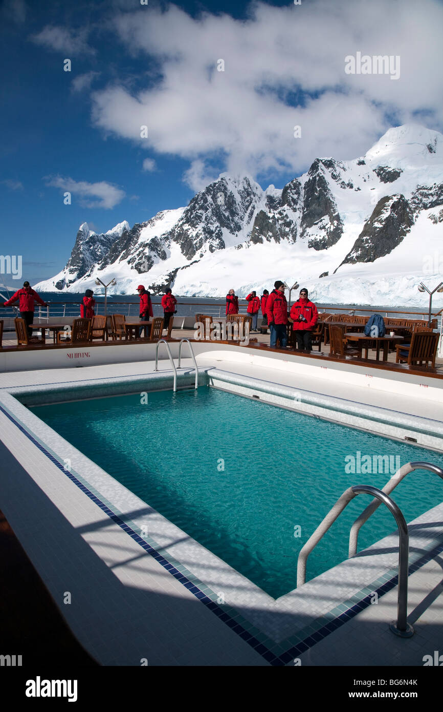 m/v Minerva cruise ship passengers on the deck, cruising through the ...