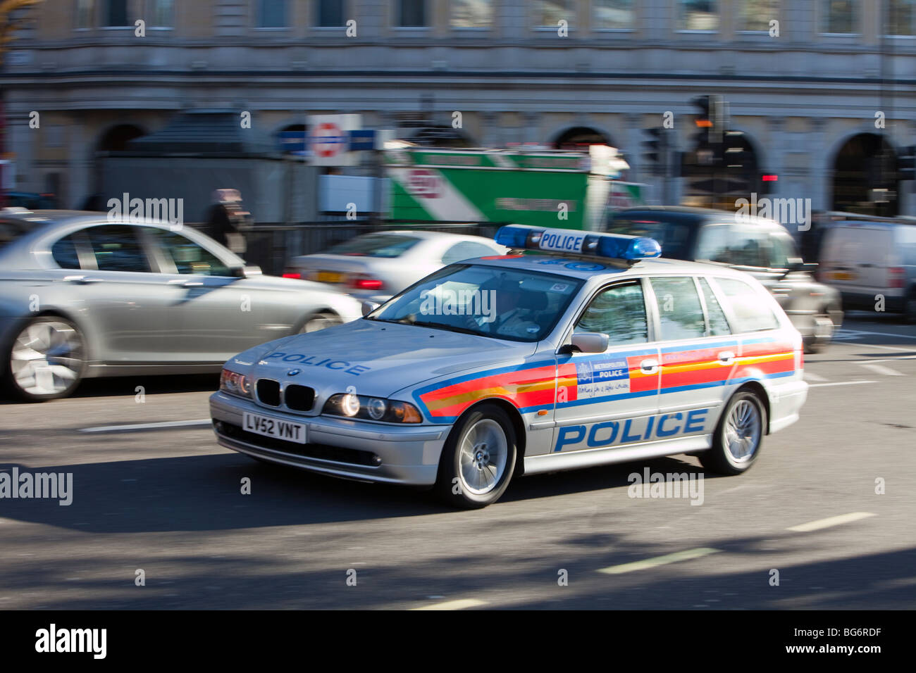 A police car racing to an emergency through the streets of London, UK ...
