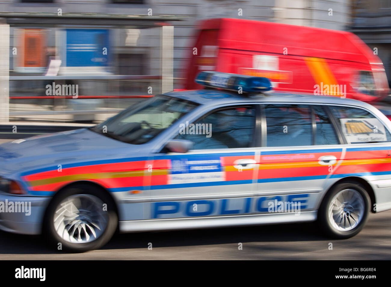 A police car racing to an emergency through the streets of London, UK ...