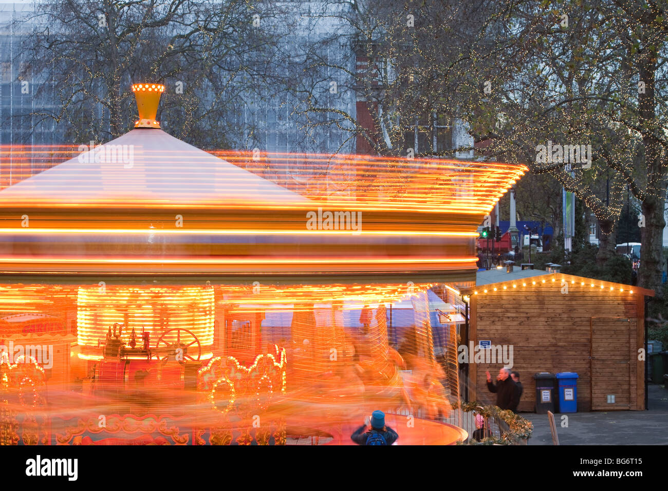 A fairground ride outside the Natural History Museum in London, UK ...