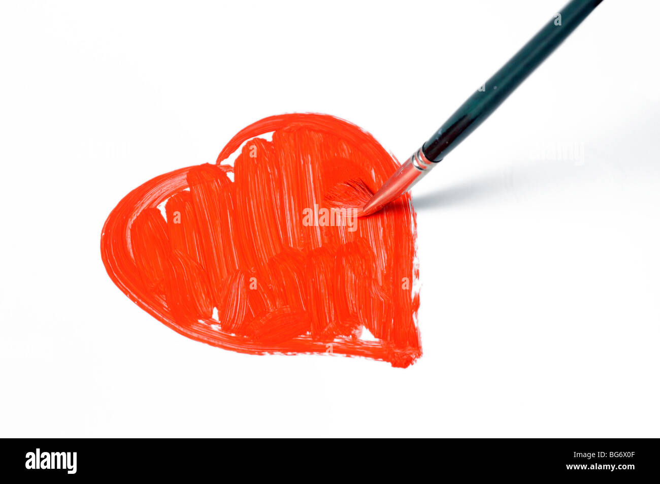 Red painted heart with brush isolated over a white background Stock ...