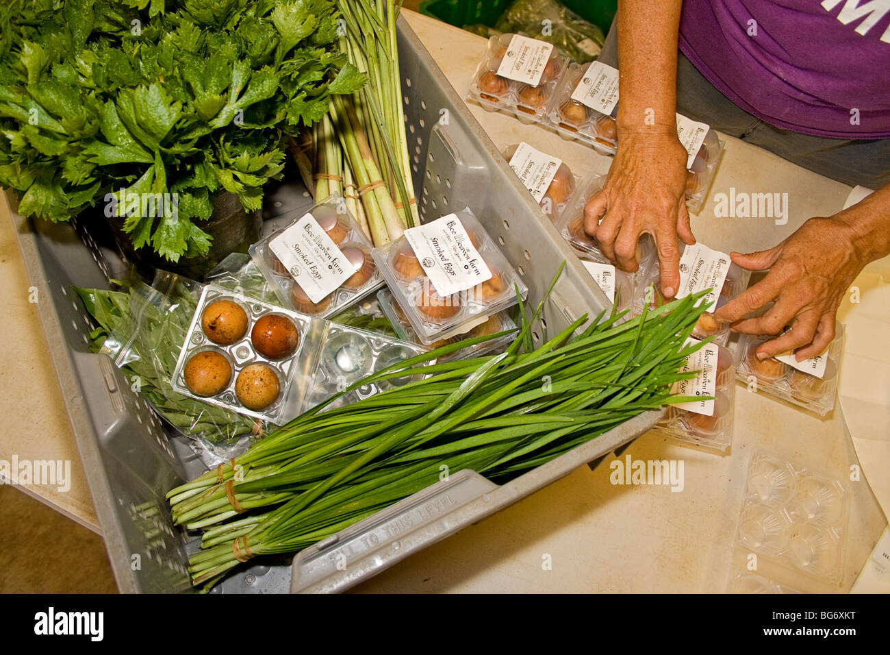 Organic produce packed for sale. The box includes from left to right ...