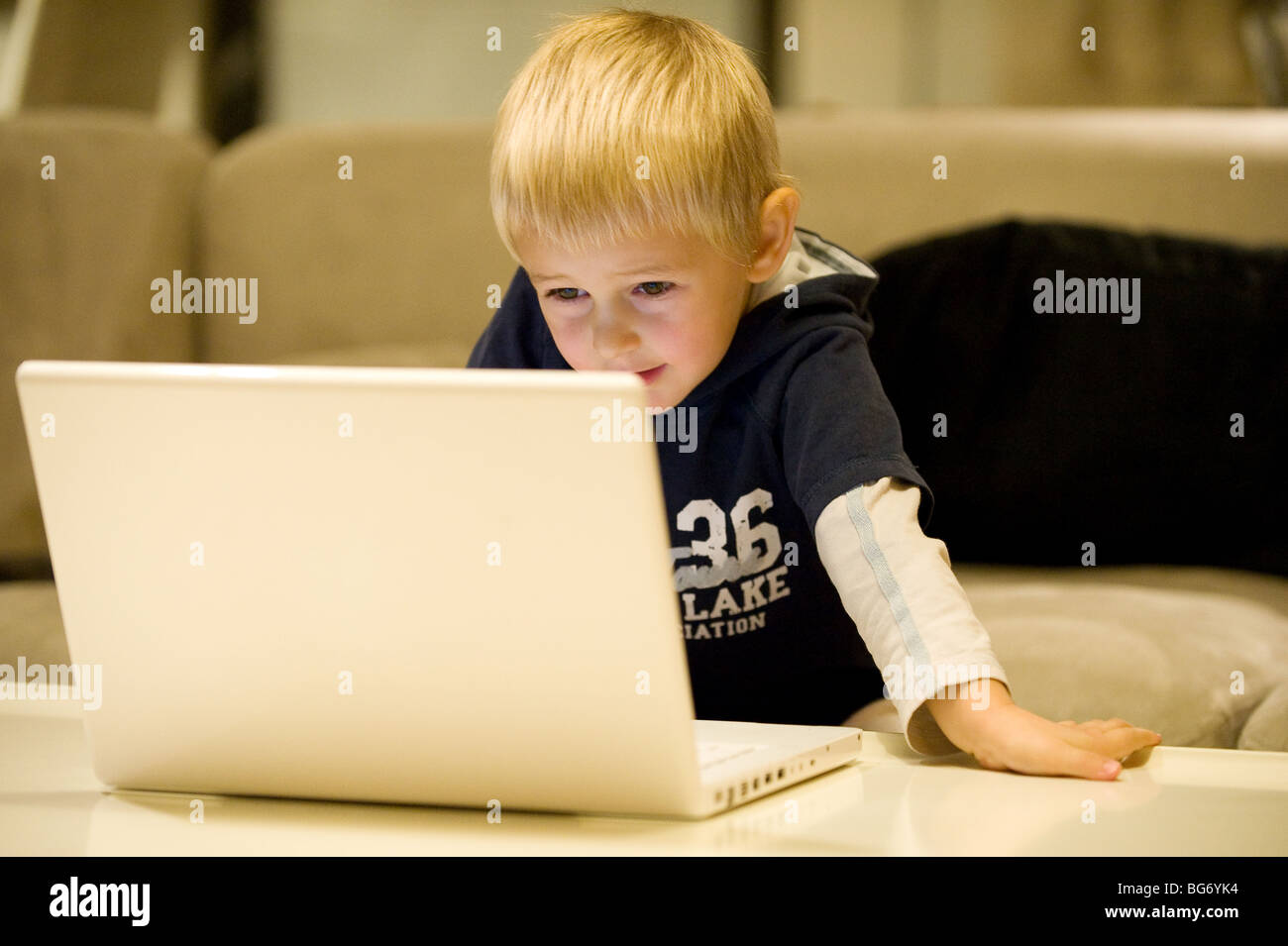 Boy with notebook Stock Photo - Alamy