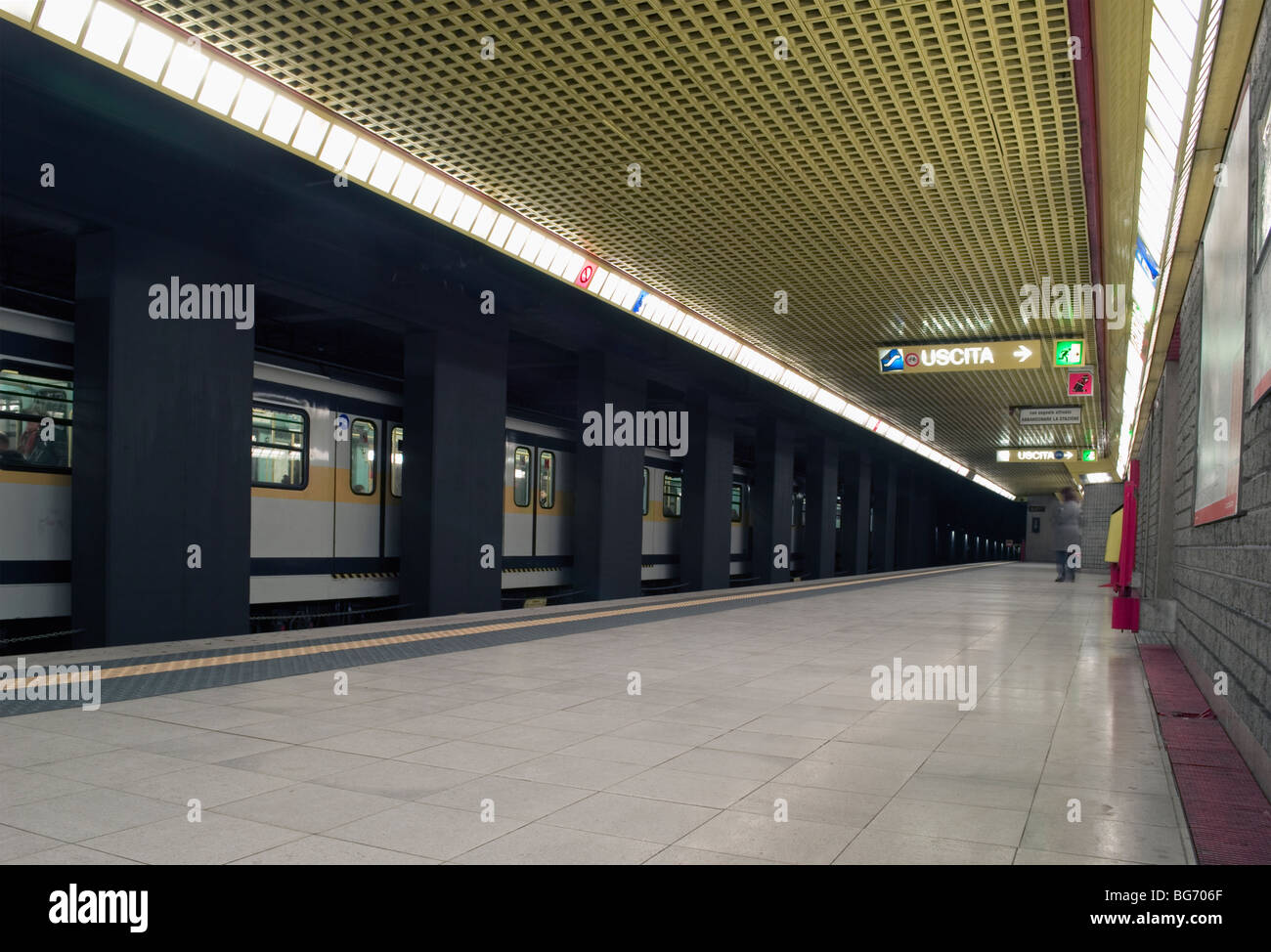 Milan subway station - yellow line - Italy Stock Photo - Alamy