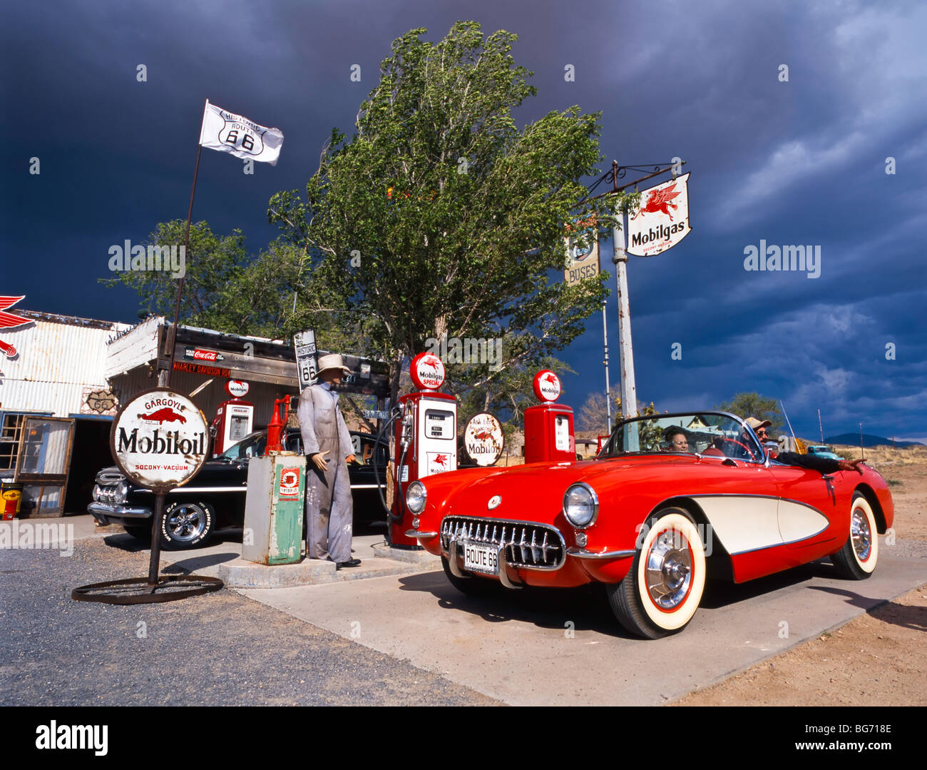 Typical Route 66 scene with a old gas station, a vintage car. Historic ...