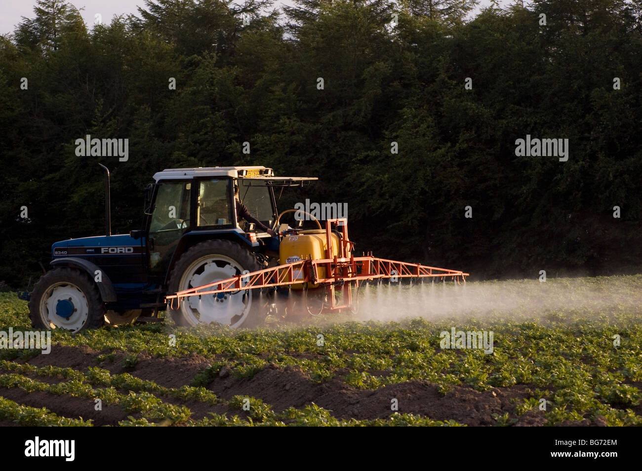 Farmer spraying crops tractor hi-res stock photography and images - Alamy