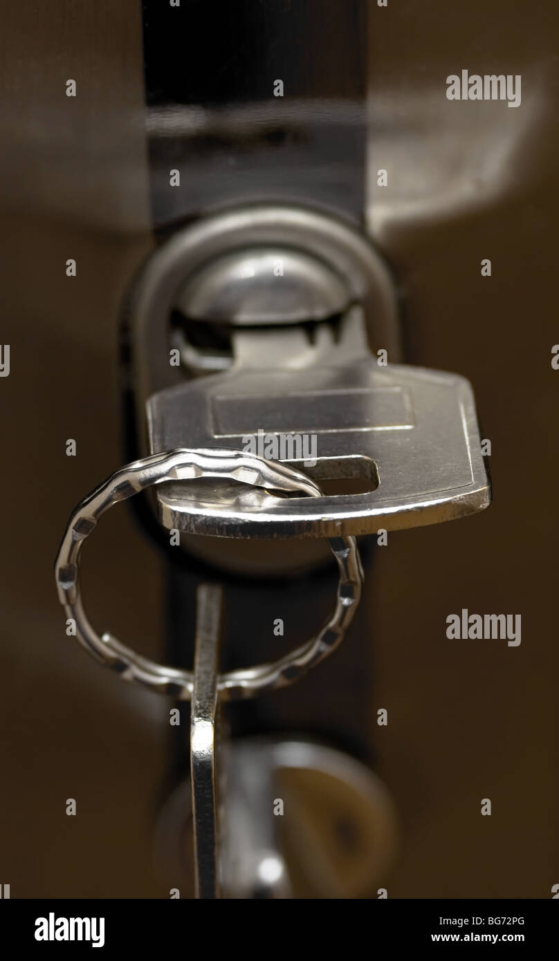 lock with a key from a door Stock Photo - Alamy