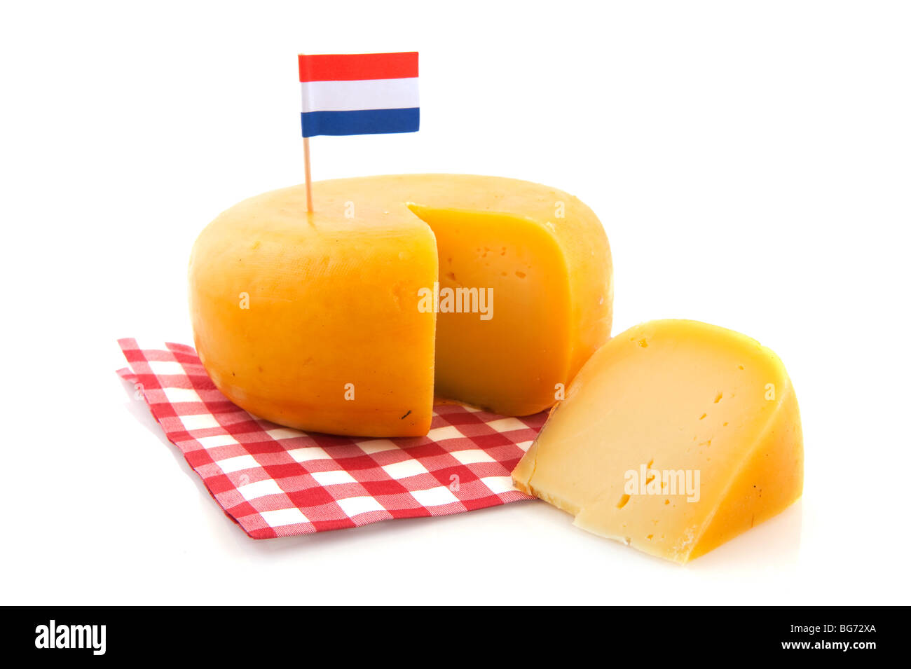 Dutch whole cheese with flag and checkered napkin Stock Photo - Alamy
