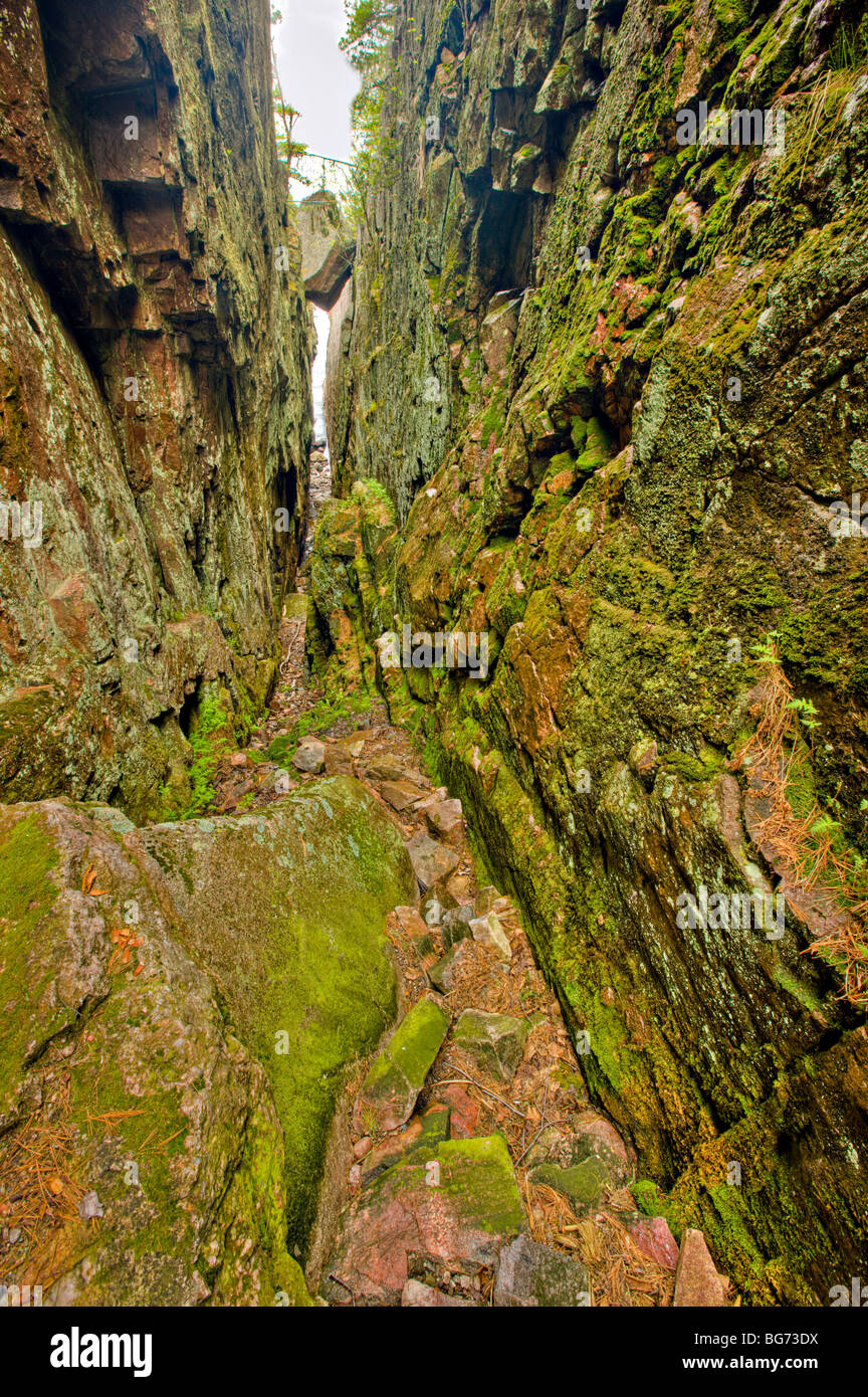 Large rock wedged above a deep chasm along the Agawa Rock Pictographs ...