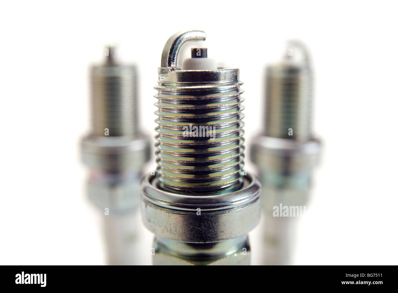 Spark plug isolated on a white background Stock Photo - Alamy