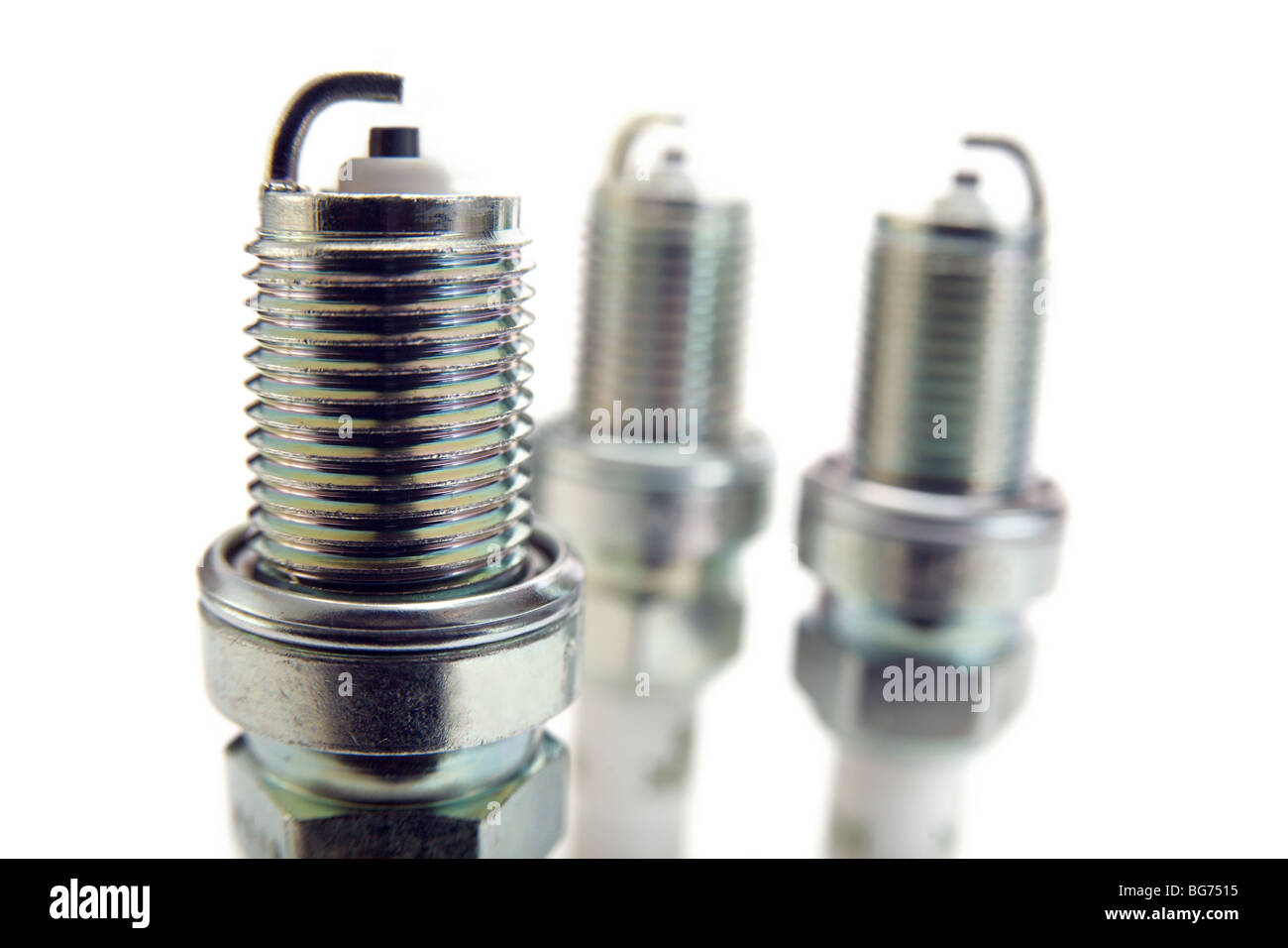 Spark plug isolated on a white background Stock Photo - Alamy