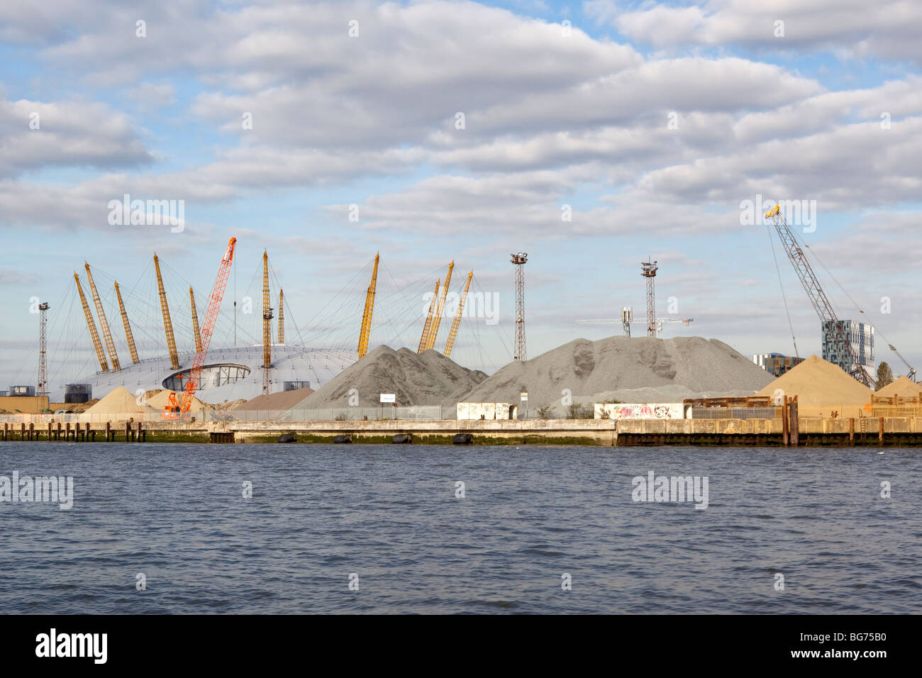 The O2 Arena and construction site from the river Thames Stock Photo ...