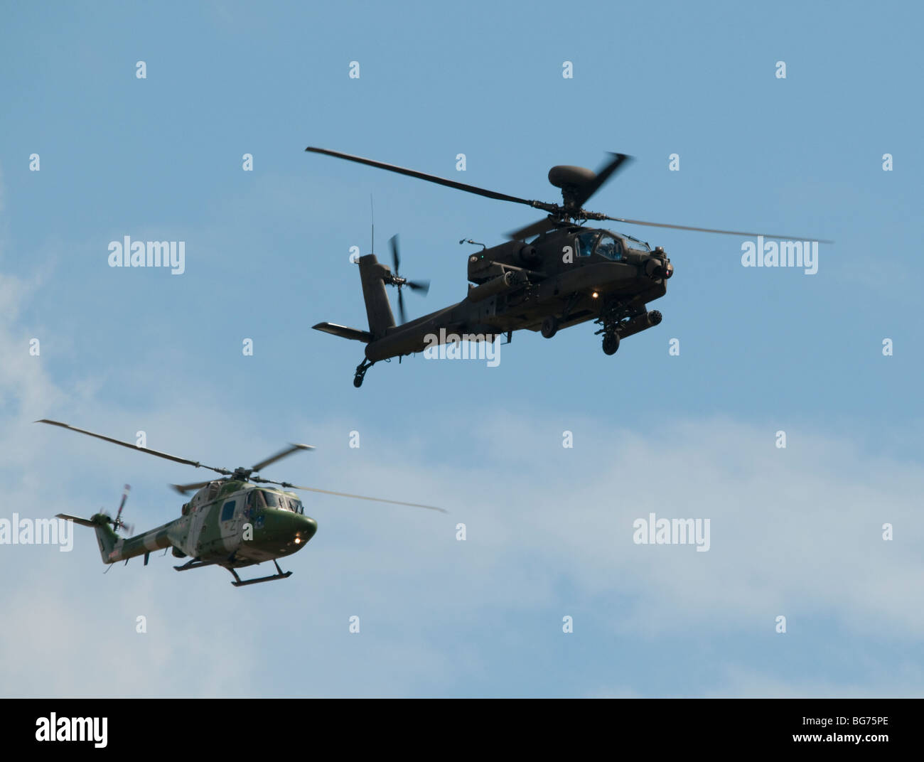 Formation flypast of an Apache and Lynx helicopter at the RAF ...