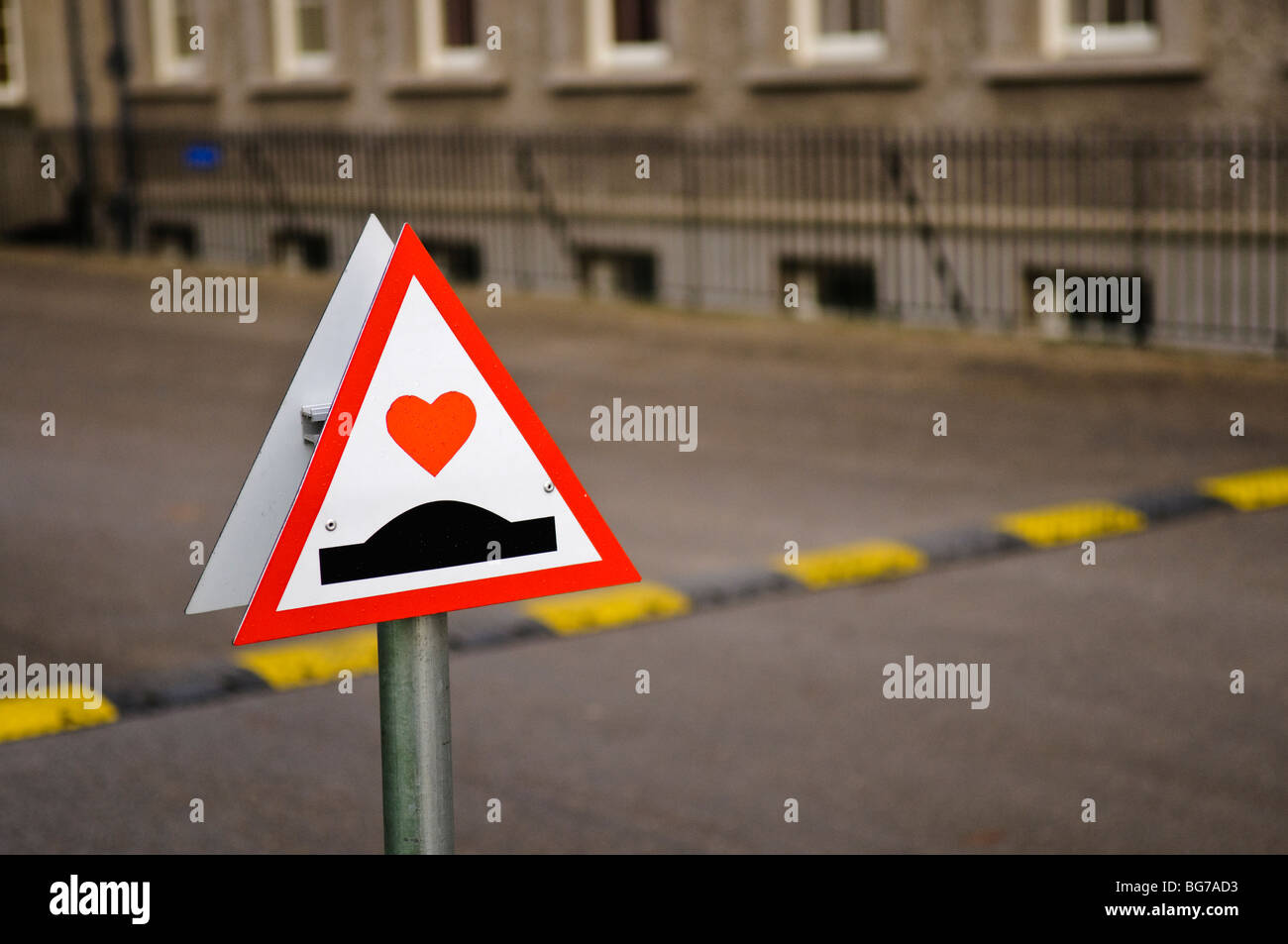 Speed ramp sign with a heart Stock Photo - Alamy